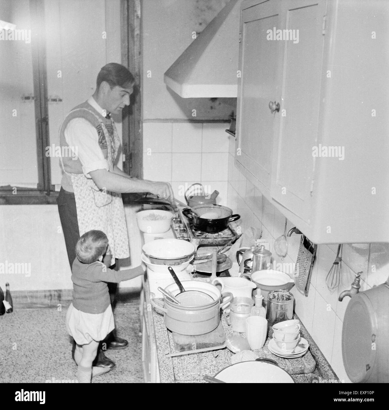 A football player is seen cooking a meal in this image, blending ...