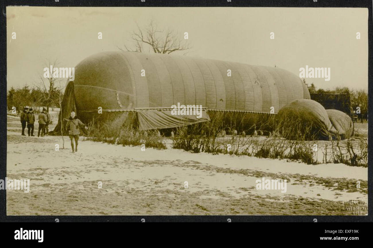 This image captures a military zeppelin during World War I, showcasing ...