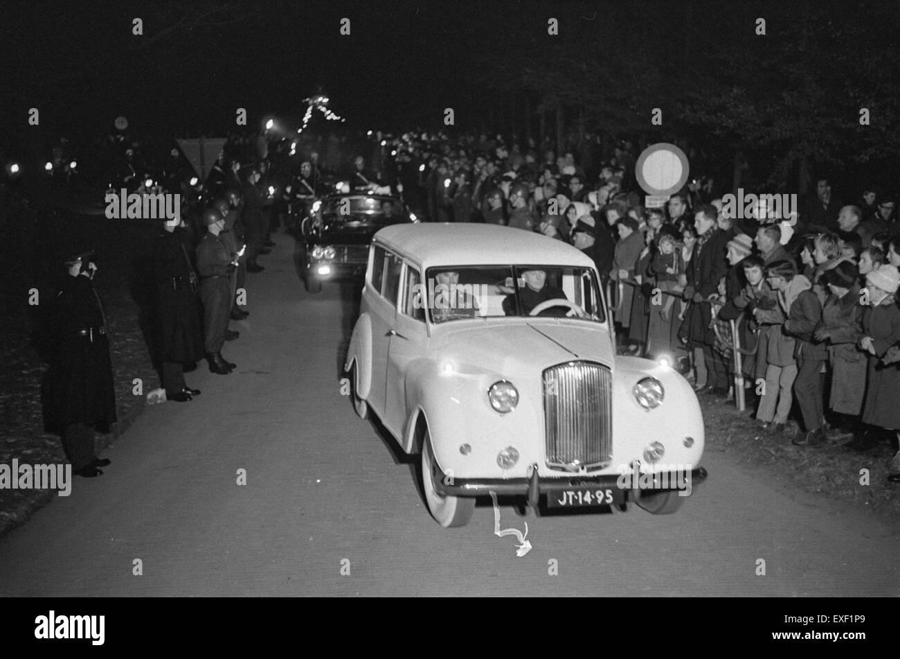 This photograph shows the funeral carriage carrying Queen Wilhelmina ...