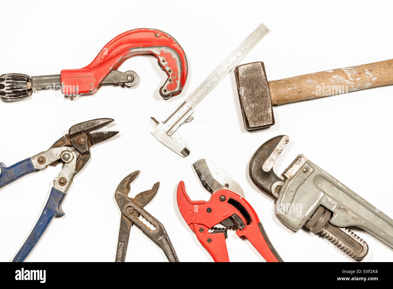 on a white background there are work tools such as cutters, pipe cutter ...
