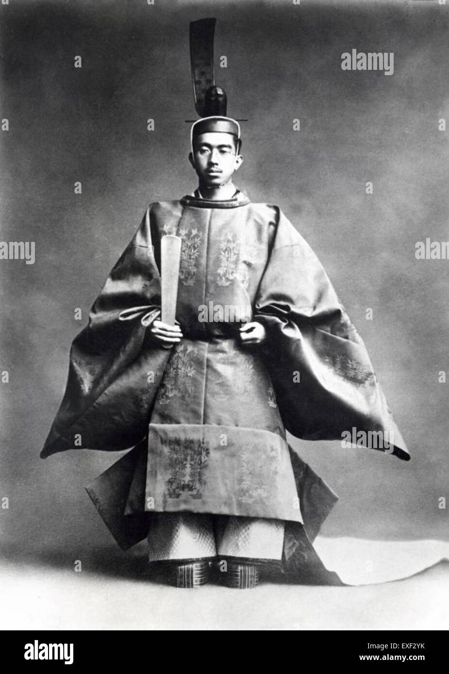This image depicts Emperor Hirohito in his crown attire, symbolizing ...