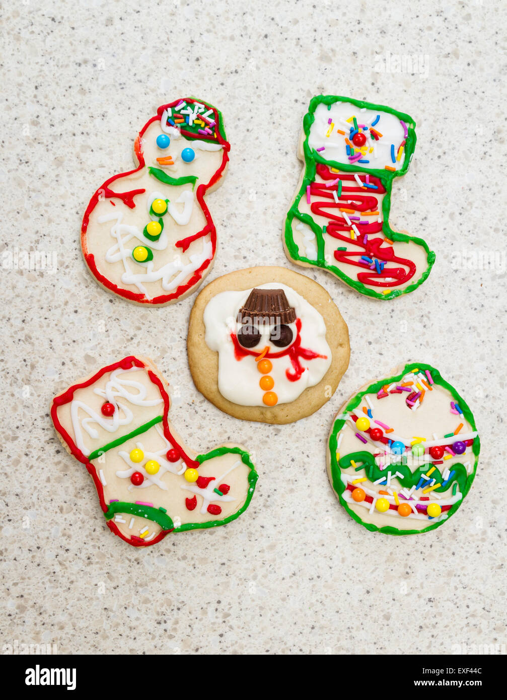 home made and decorated christmas cookies of various shapes and colors ...