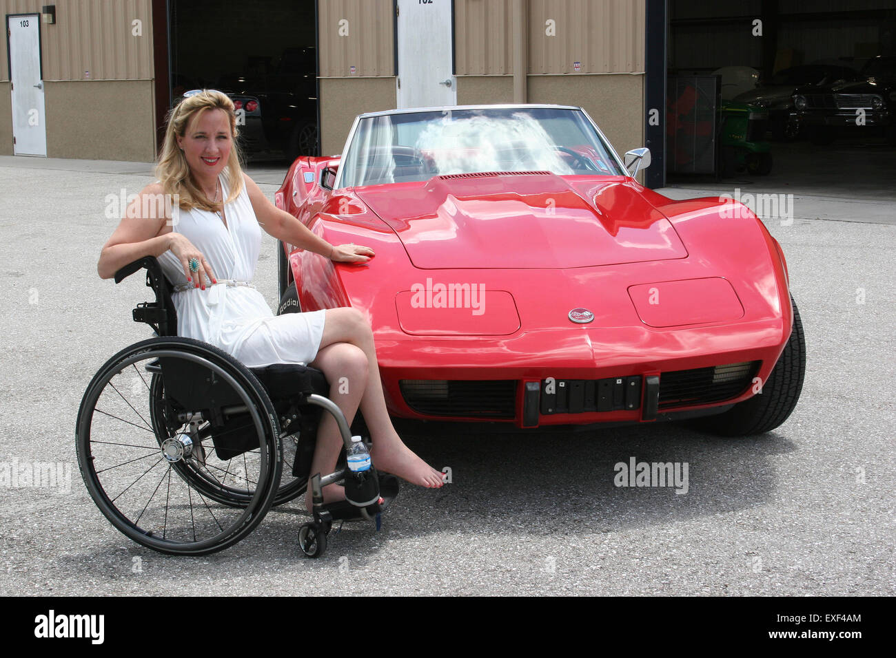 Woman driving corvette hi-res stock photography and images - Alamy