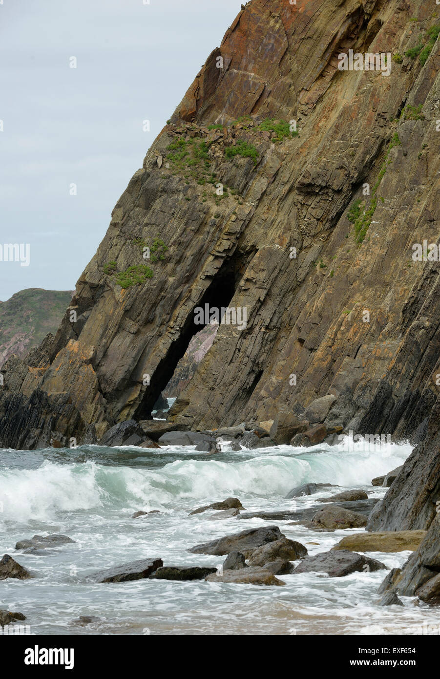 High Tide at Marloes Sands Beach with Rock Arch in vertical cliff ...