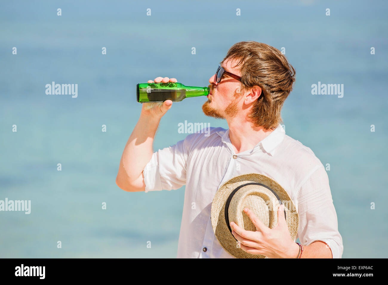 Male on sunbed hi-res stock photography and images - Alamy