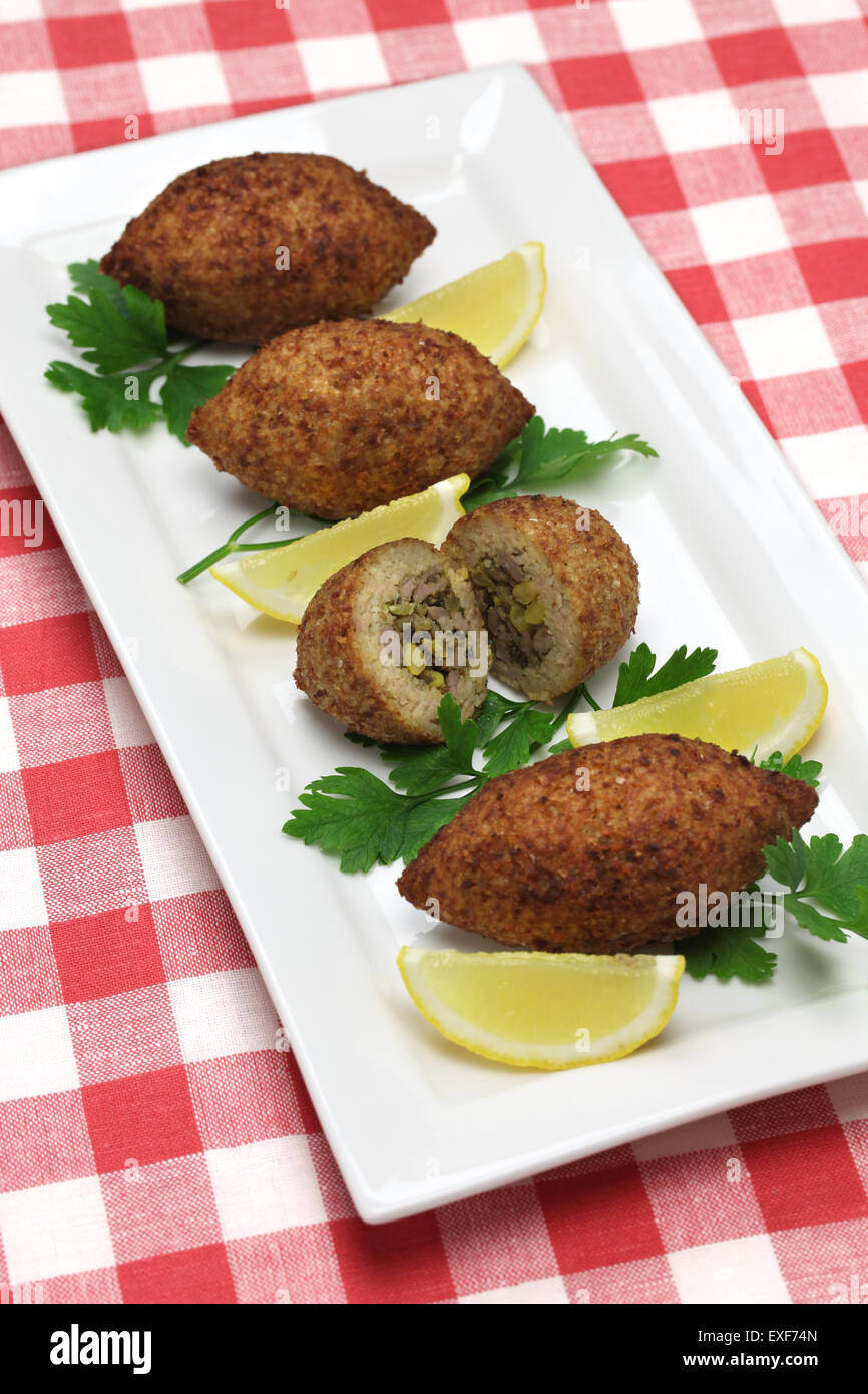homemade kibbeh, middle eastern food, fried croquette with bulgur and ...
