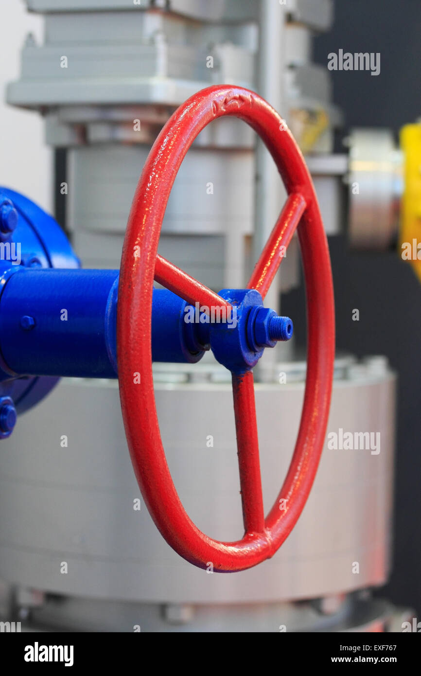 Red handwheel of the industrial steel gate valve Stock Photo - Alamy