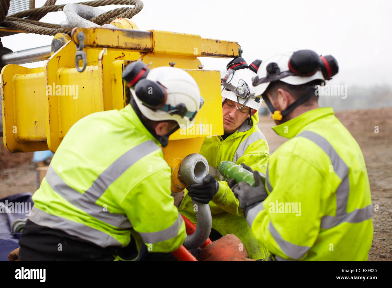 Engineers working on wind turbine Stock Photo - Alamy