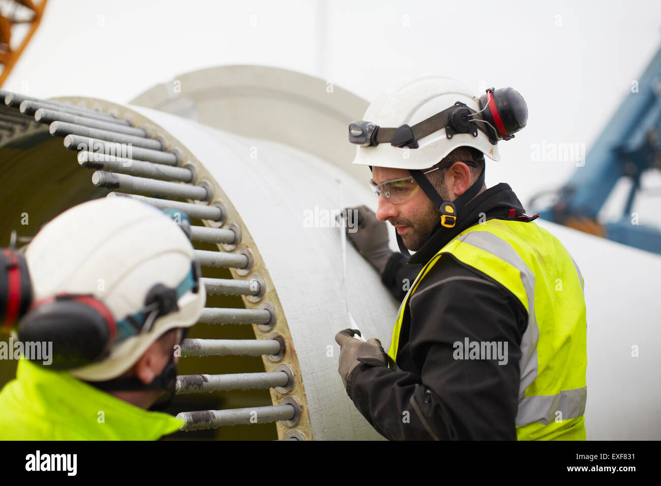 Engineers working on wind turbine Stock Photo - Alamy