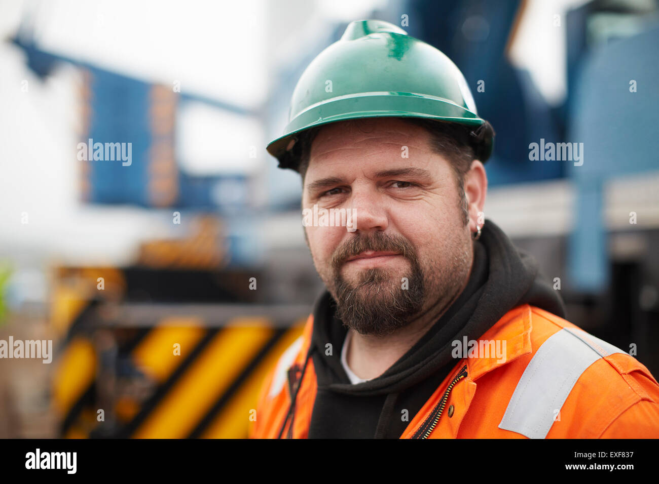 Portrait of engineer at wind farm Stock Photo - Alamy