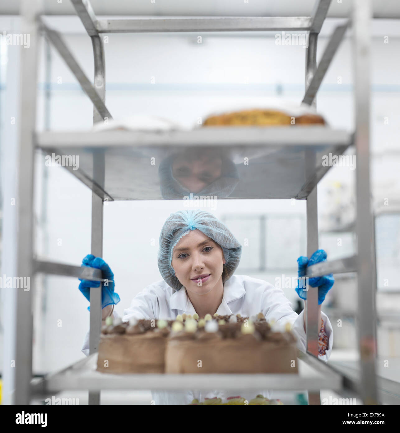 Baker holding cakes hi-res stock photography and images - Alamy