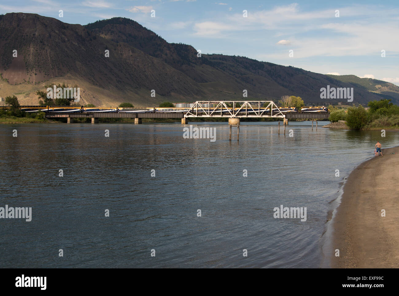 Rocky Mountaineer Train crossing Thompson River at Kamloops Stock Photo ...