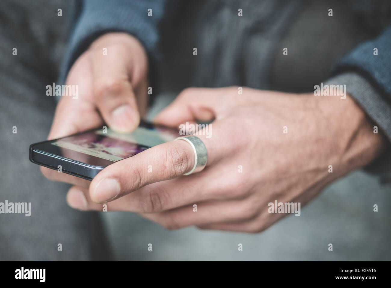 Close up of businessman hands texting on smartphone Stock Photo - Alamy