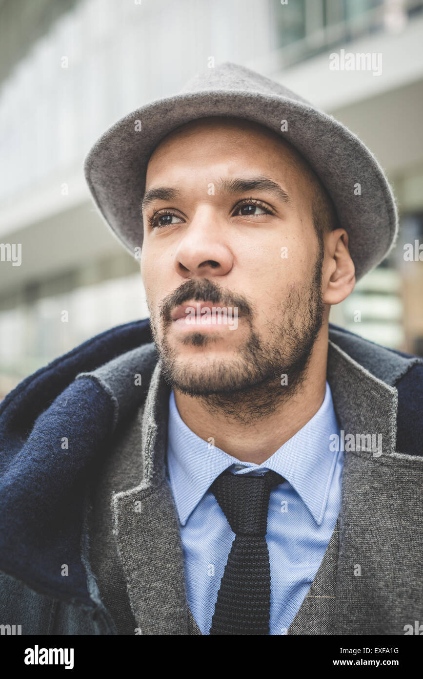 Close up portrait of businessman waiting outside office building Stock ...
