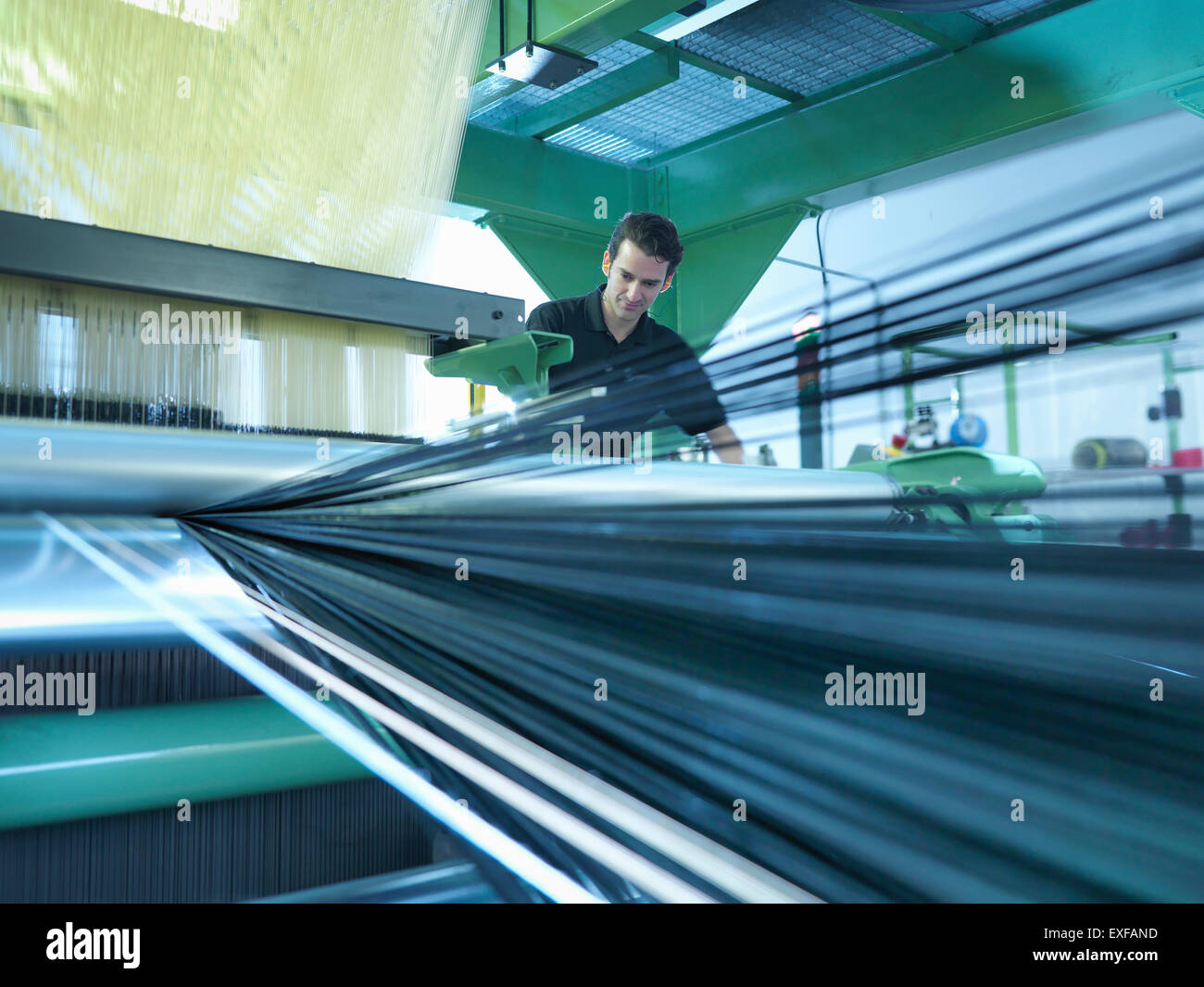 Worker operating hi-res stock photography and images - Alamy