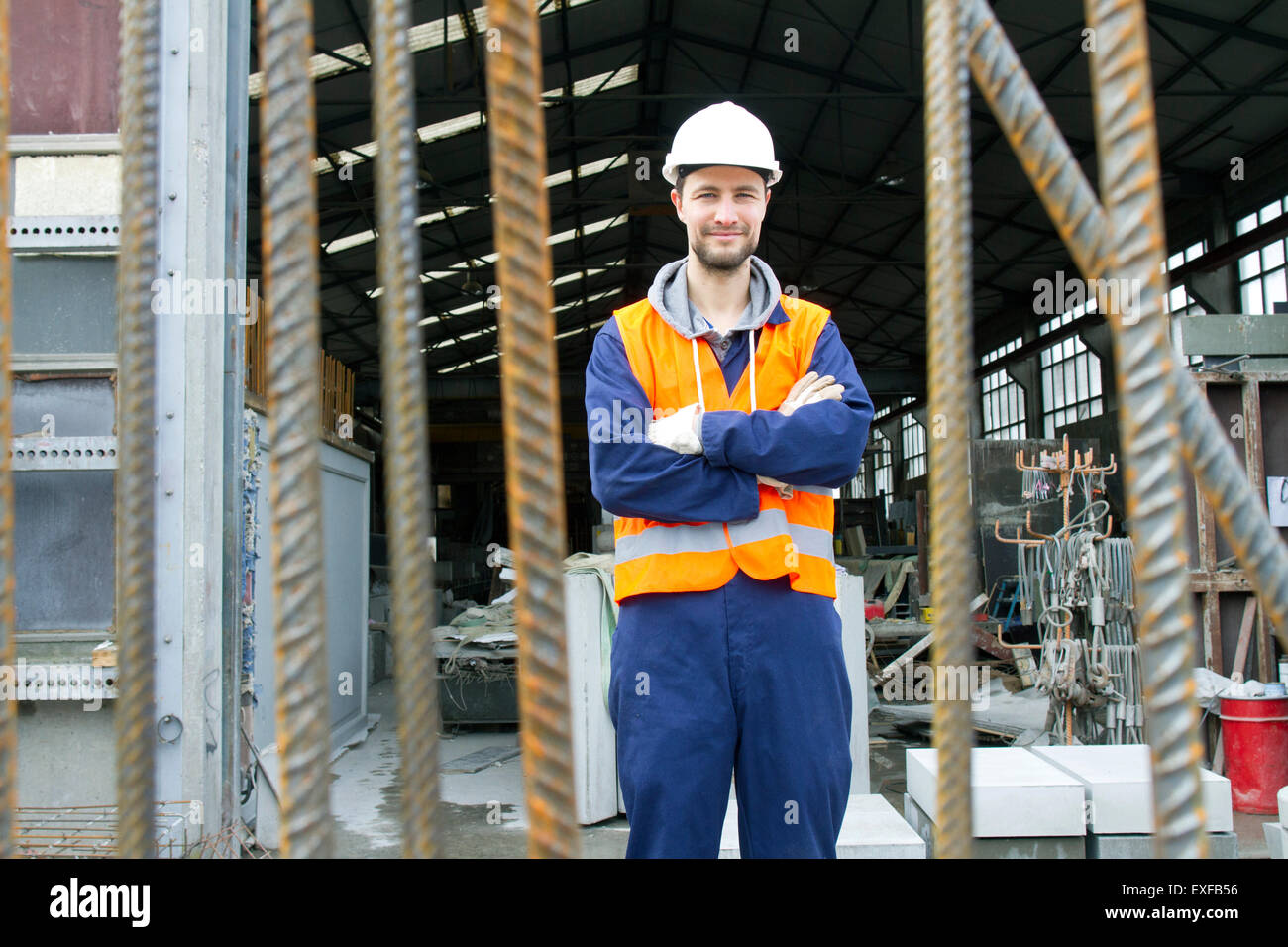 Portrait of factory worker outside concrete reinforcement factory Stock ...