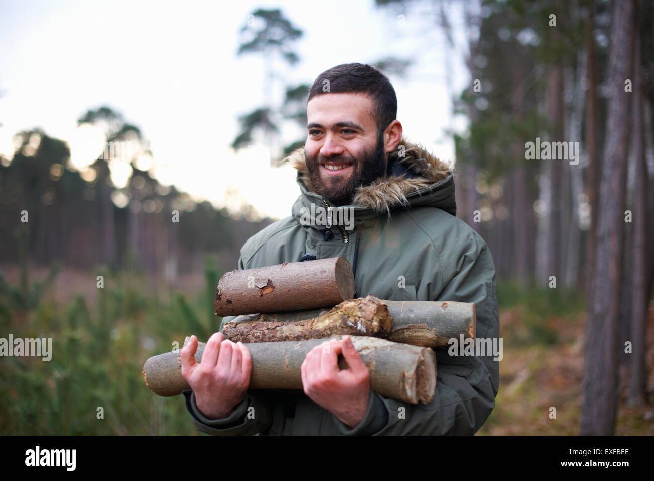Man carrying wood forest hi-res stock photography and images - Alamy