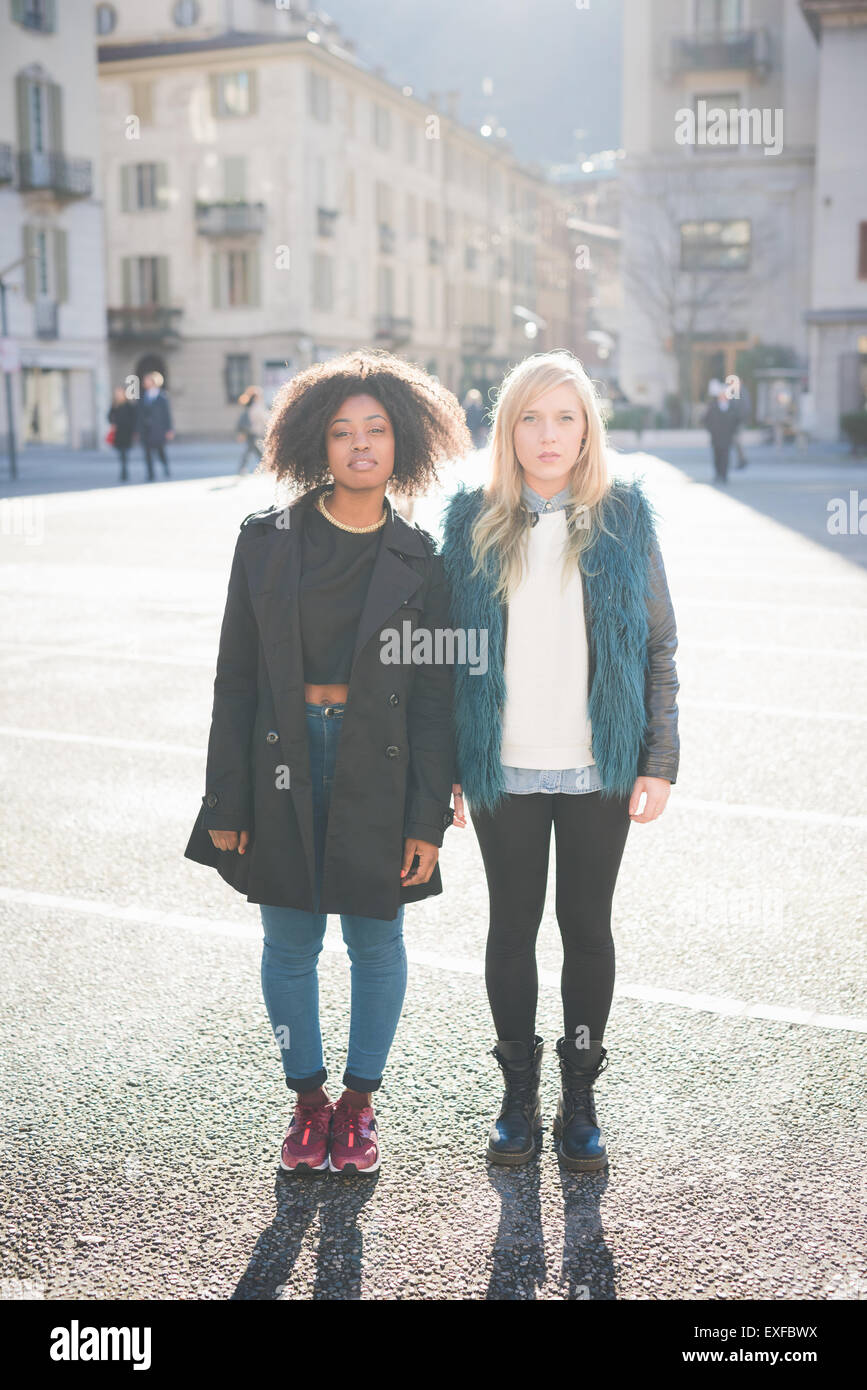 Friends standing in square hi-res stock photography and images - Alamy
