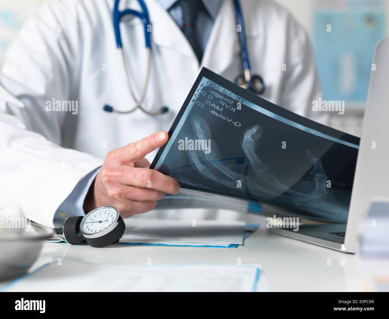 Cropped shot of doctor viewing x-ray of hand in clinic Stock Photo - Alamy