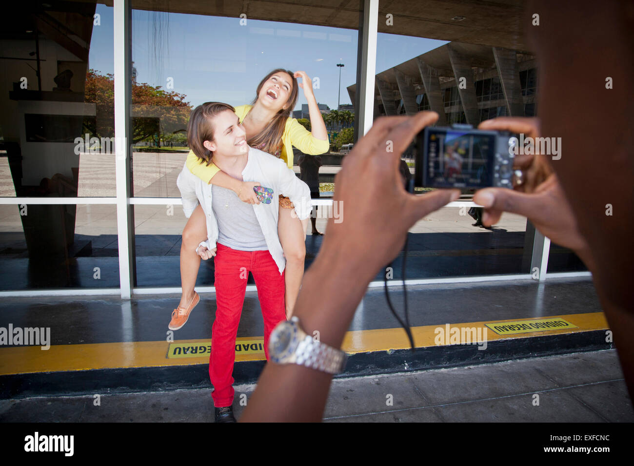 Student photographer taking picture of friends Stock Photo - Alamy