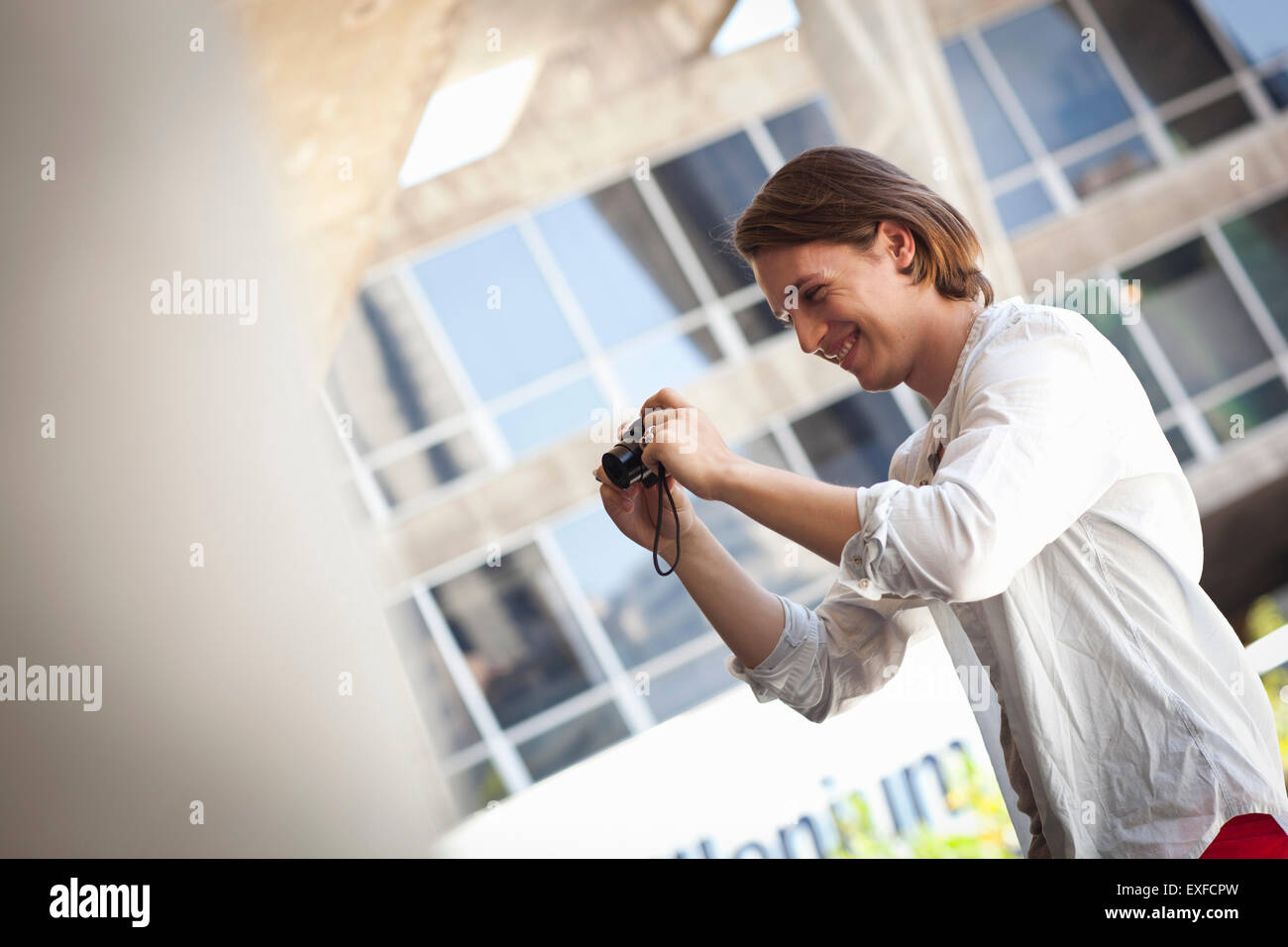 Student photographer taking picture Stock Photo - Alamy