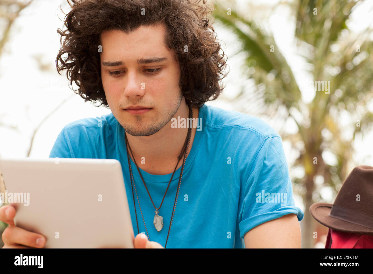 Serious young man tablet hi-res stock photography and images - Alamy