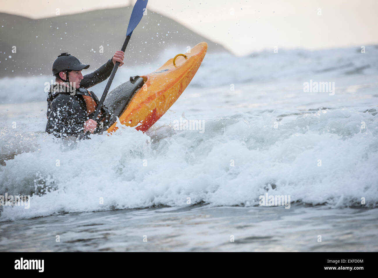 Man sea kayaking Stock Photo - Alamy