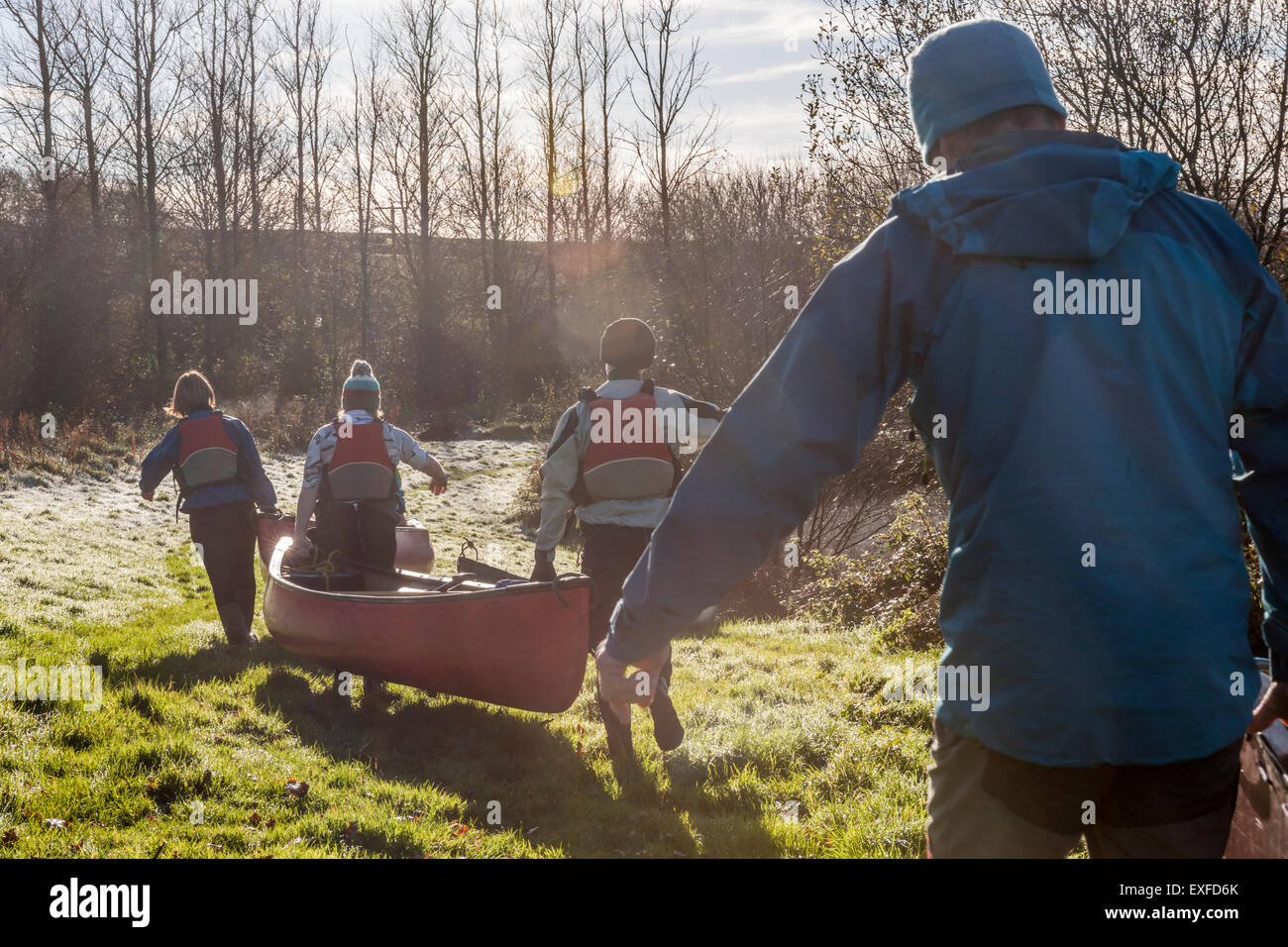 Man carrying canoe hi-res stock photography and images - Alamy