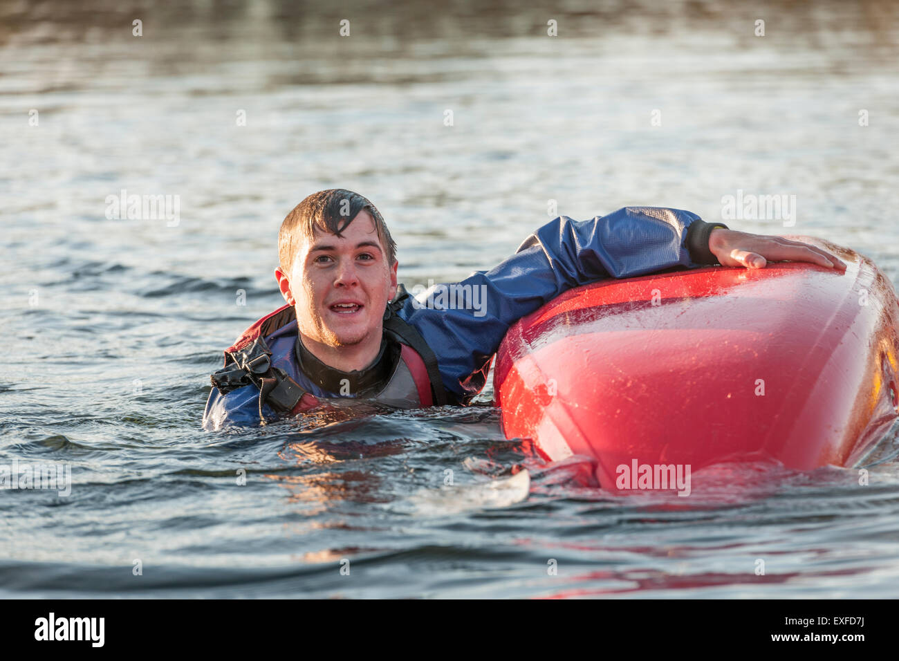Young men in kayak hi-res stock photography and images - Alamy