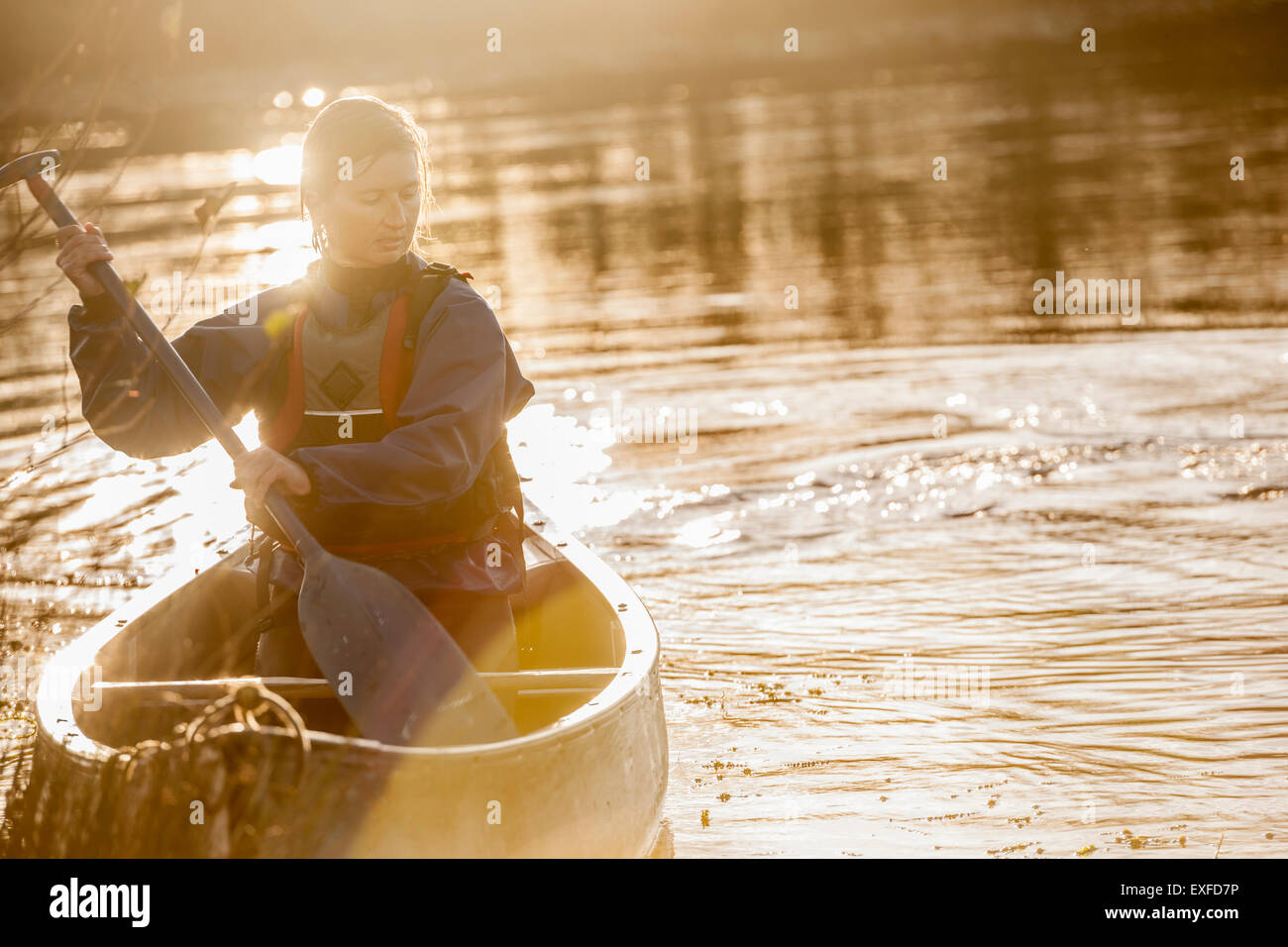 Woman canoeing hi-res stock photography and images - Alamy