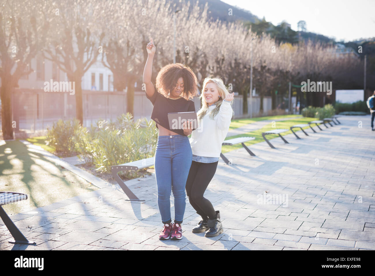 Group young female friends digital hi-res stock photography and images ...