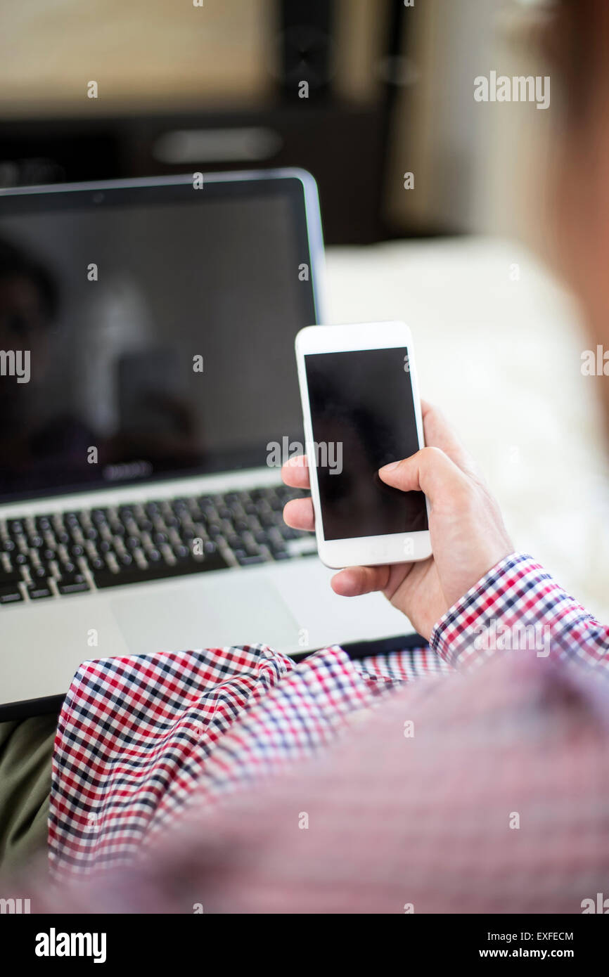 Busy handsome young man hi-res stock photography and images - Alamy