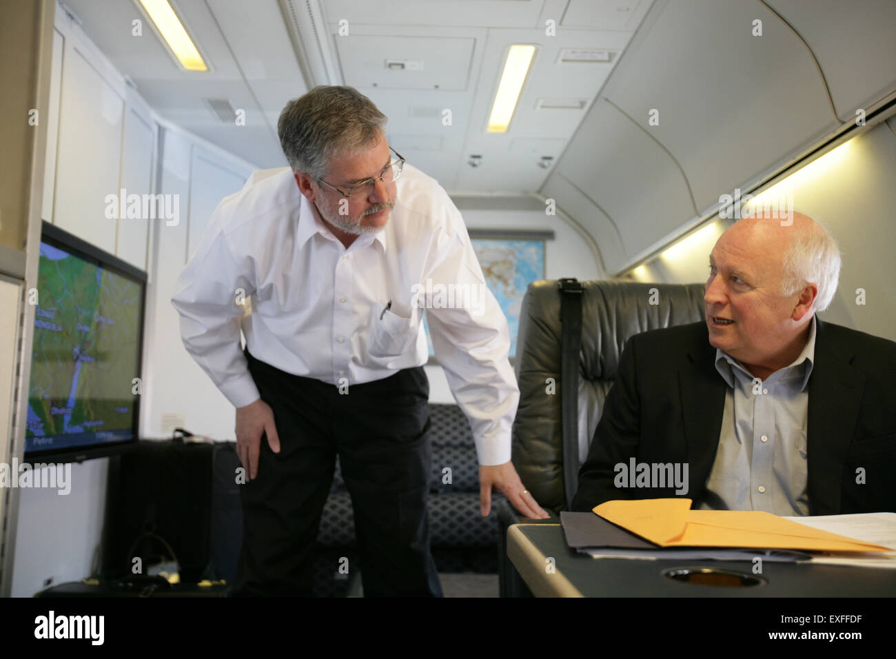 Vice President Cheney Talks with David Addington Aboard Air Force Stock ...