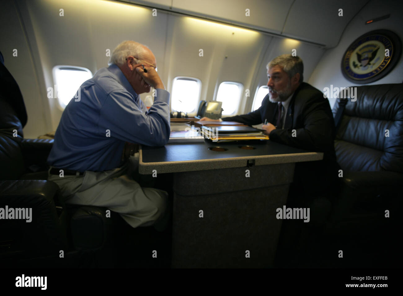Vice President Cheney Talks with David Addington Aboard Air Force Stock ...