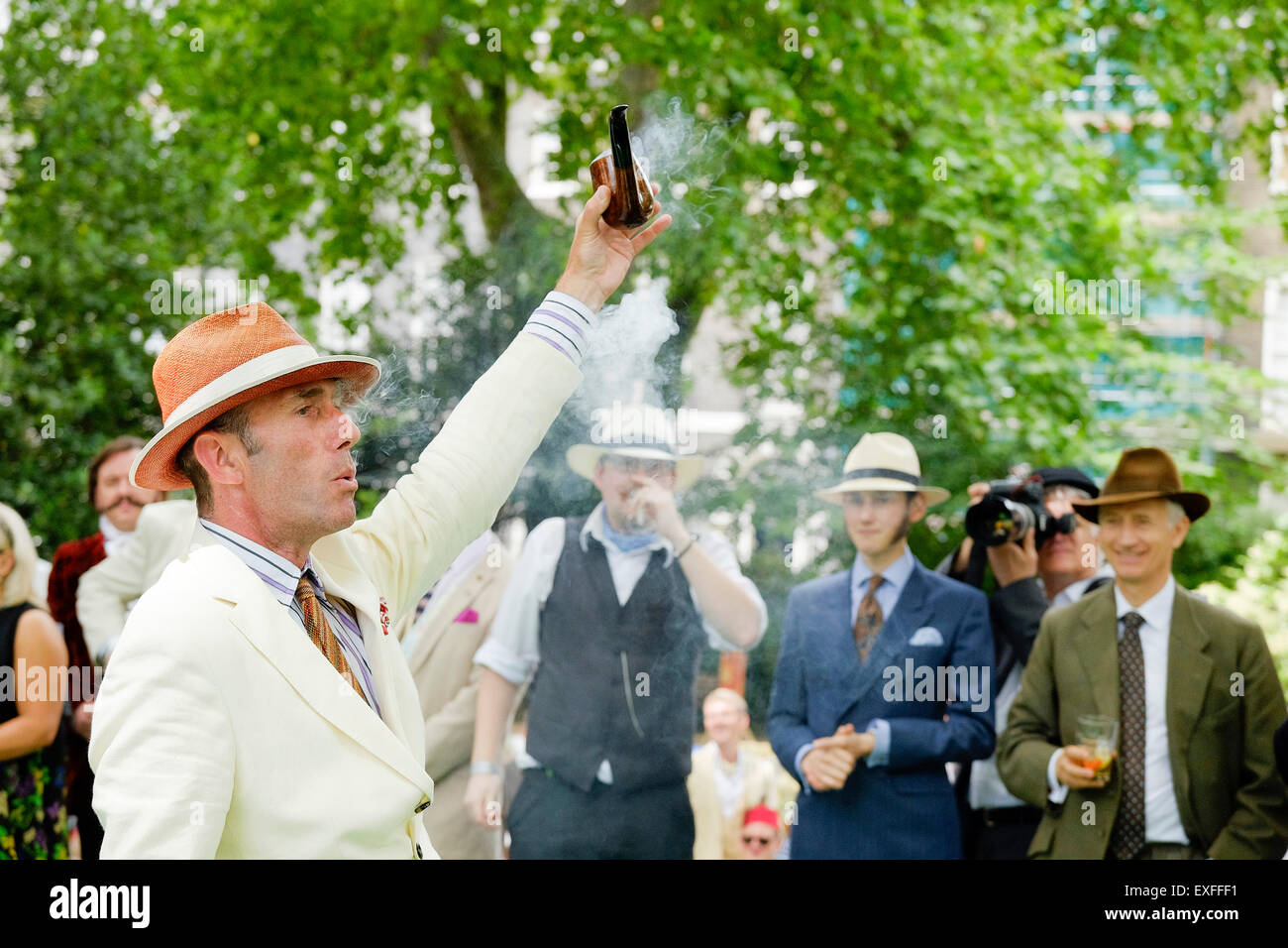 Gustav Temple holds aloft the official Olympic Pipe at the opening ...