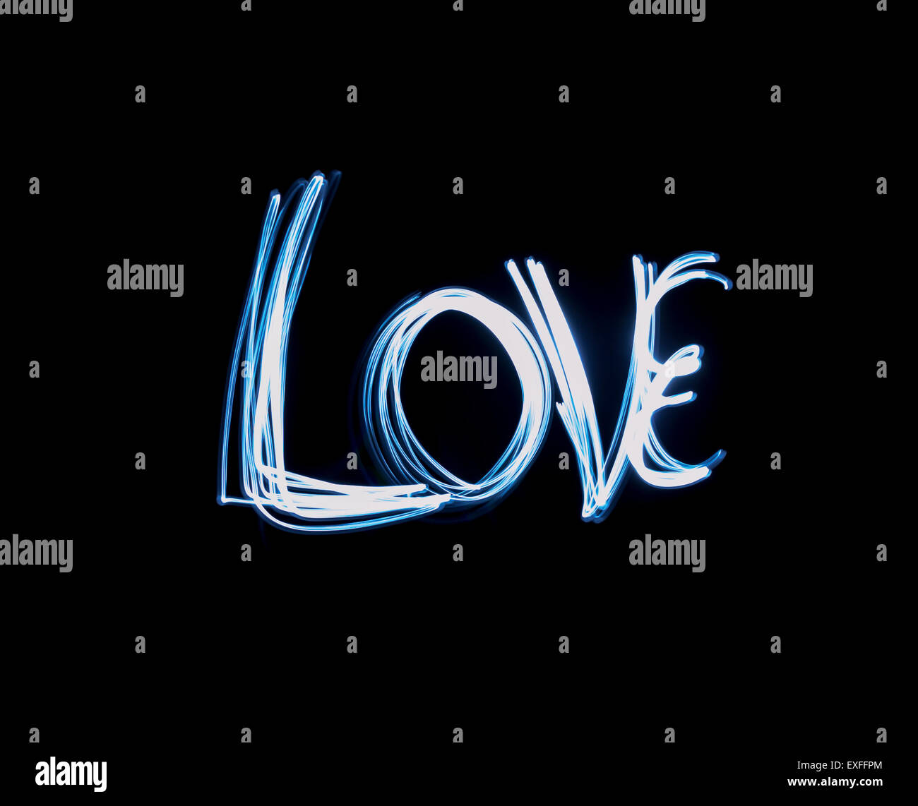 Single love text painted in blue light in the darkness Stock Photo - Alamy