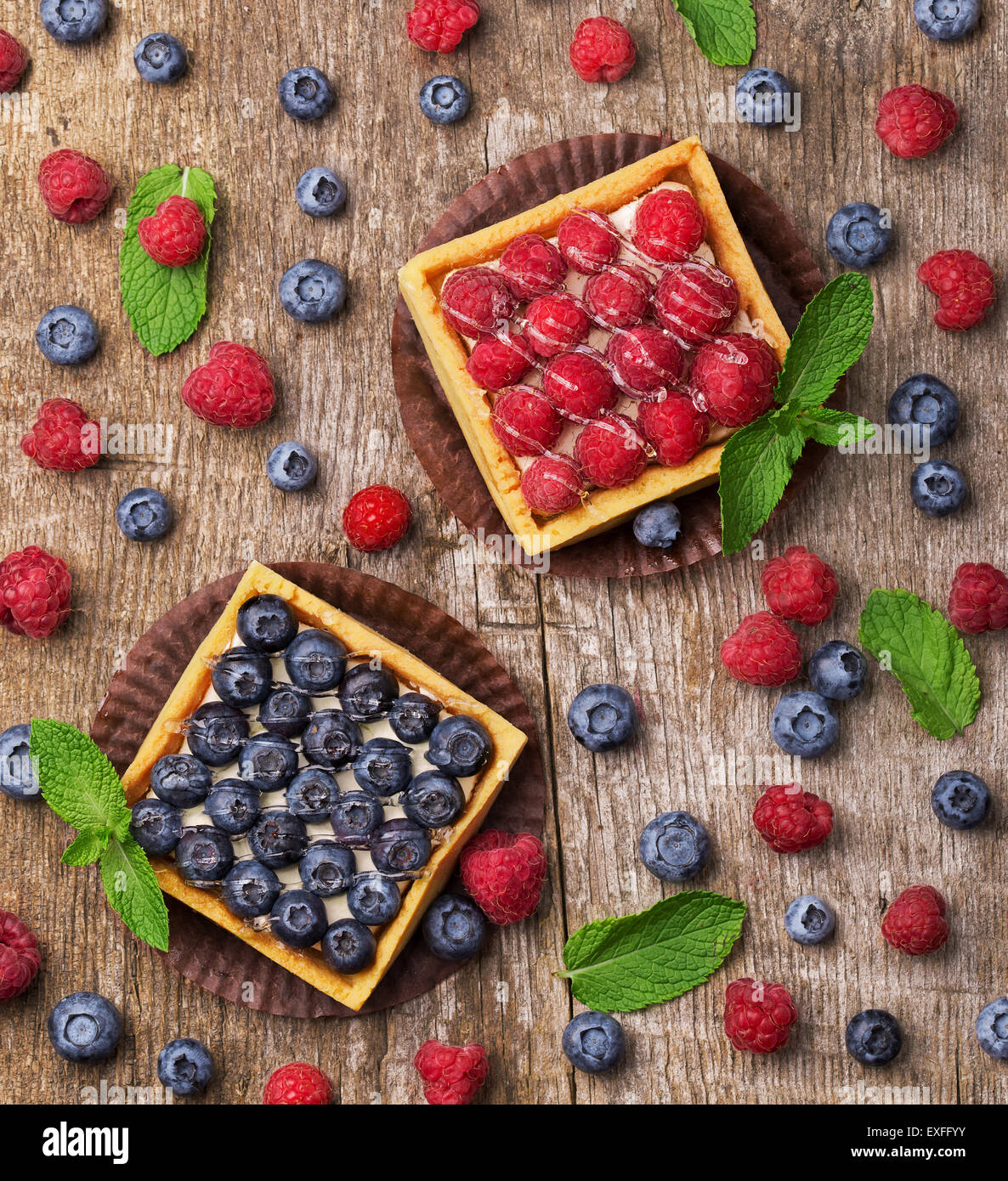 sweet cakes with fresh berries Stock Photo - Alamy