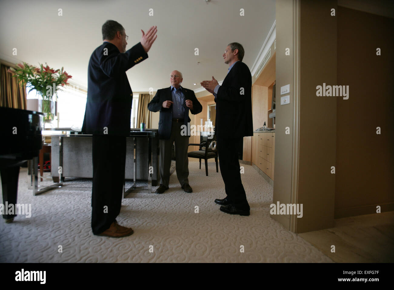 Vice President Cheney Talks with David Addington and John Hannah Stock ...