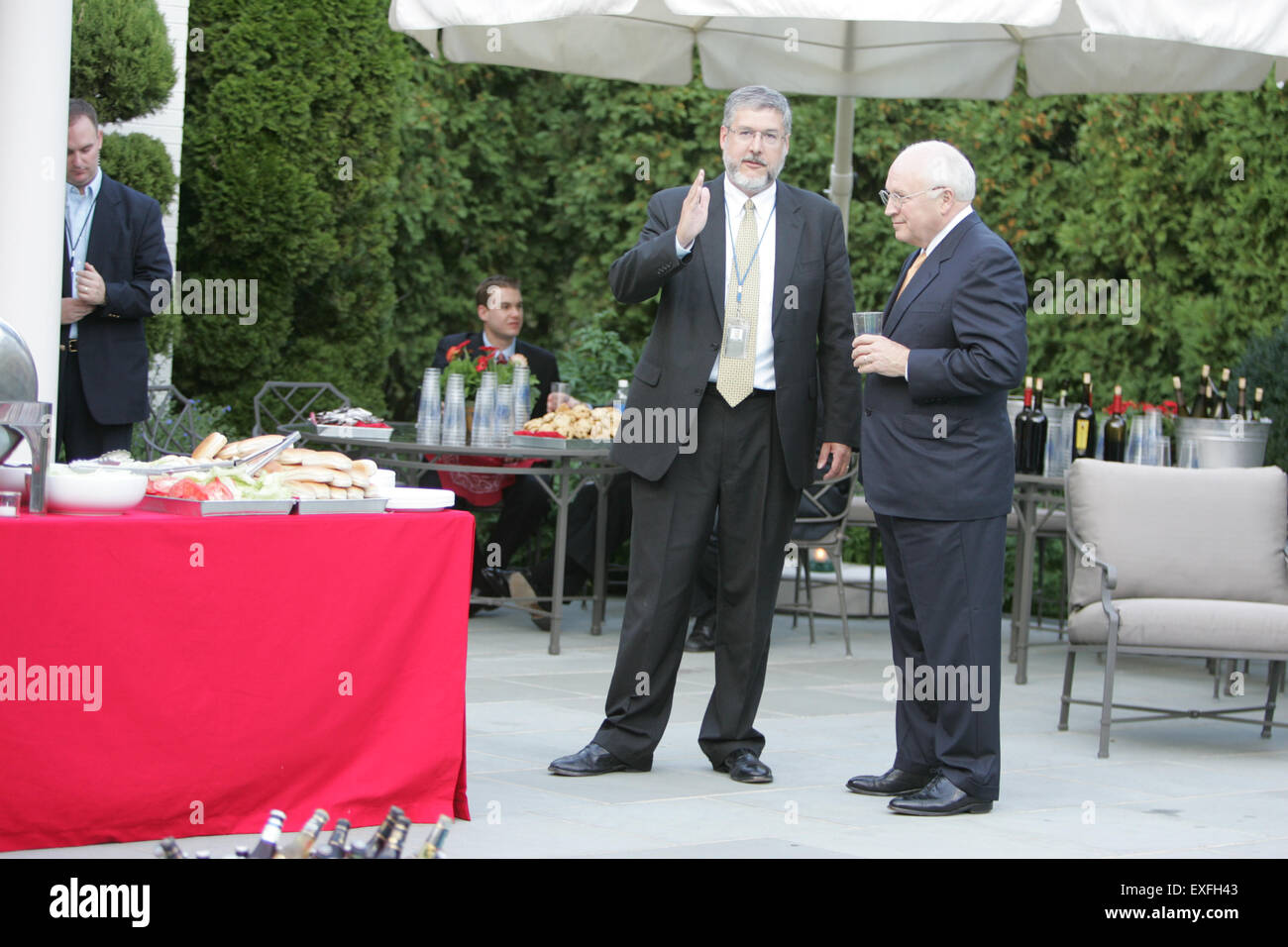 Vice President Cheney with David Addington at a Staff Barbecue Stock ...