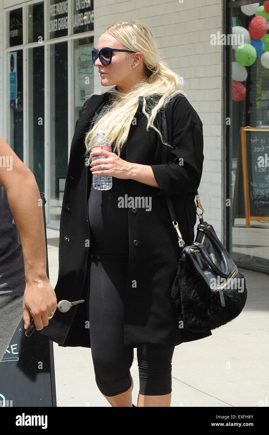 A heavily pregnant Ashlee Simpson leaves the gym in Studio City with ...