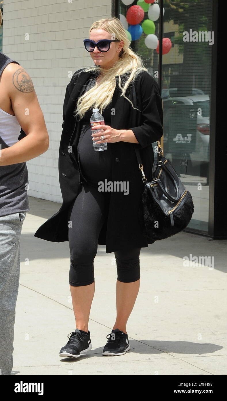 A heavily pregnant Ashlee Simpson leaves the gym in Studio City with ...