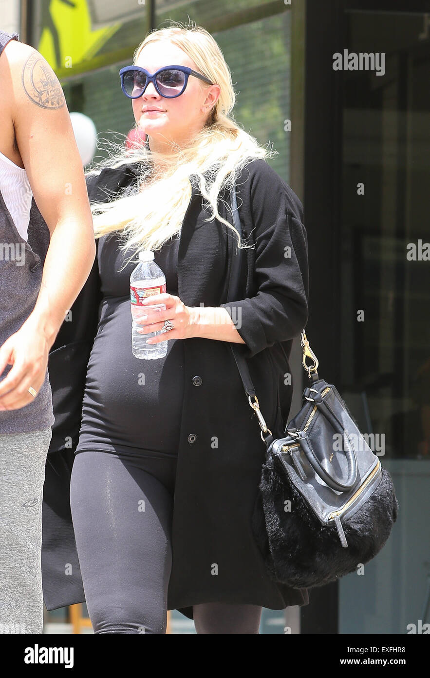 A heavily pregnant Ashlee Simpson leaves the gym in Studio City with ...