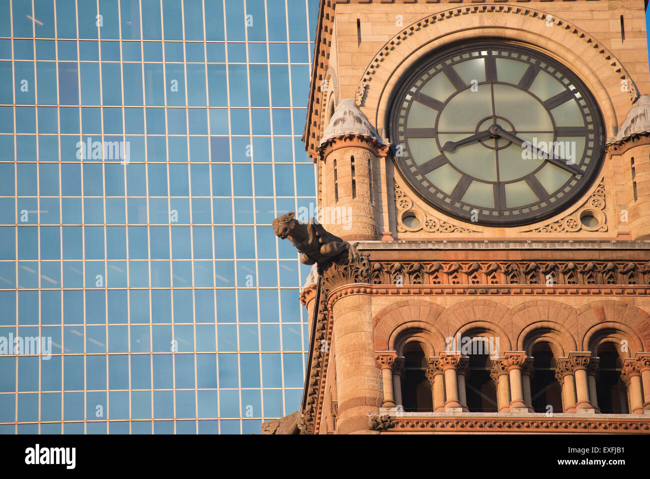 Detail of Toronto's city hall tower clock against modern building Stock ...