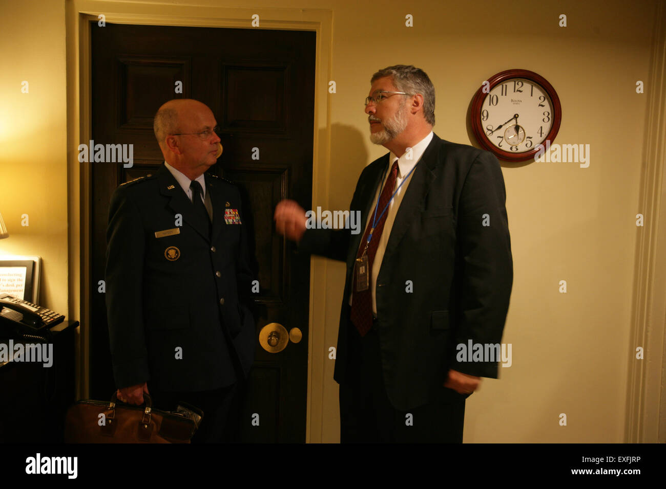 David Addington Talks With CIA Director General Michael Hayden in Stock ...