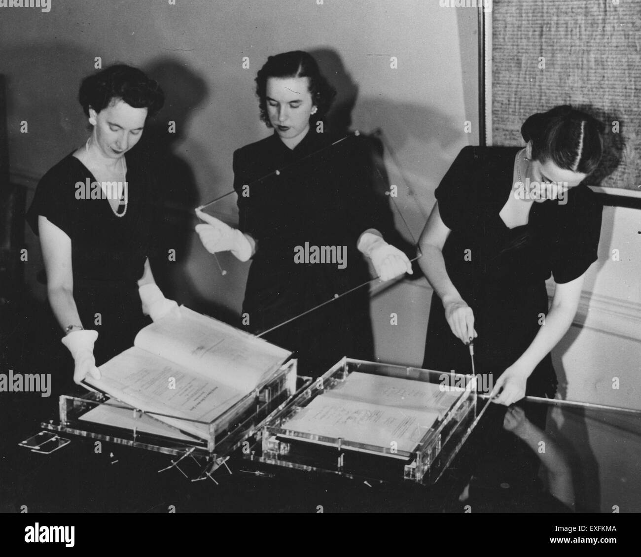 Photograph of National Archives Personnel Working on Installation of ...