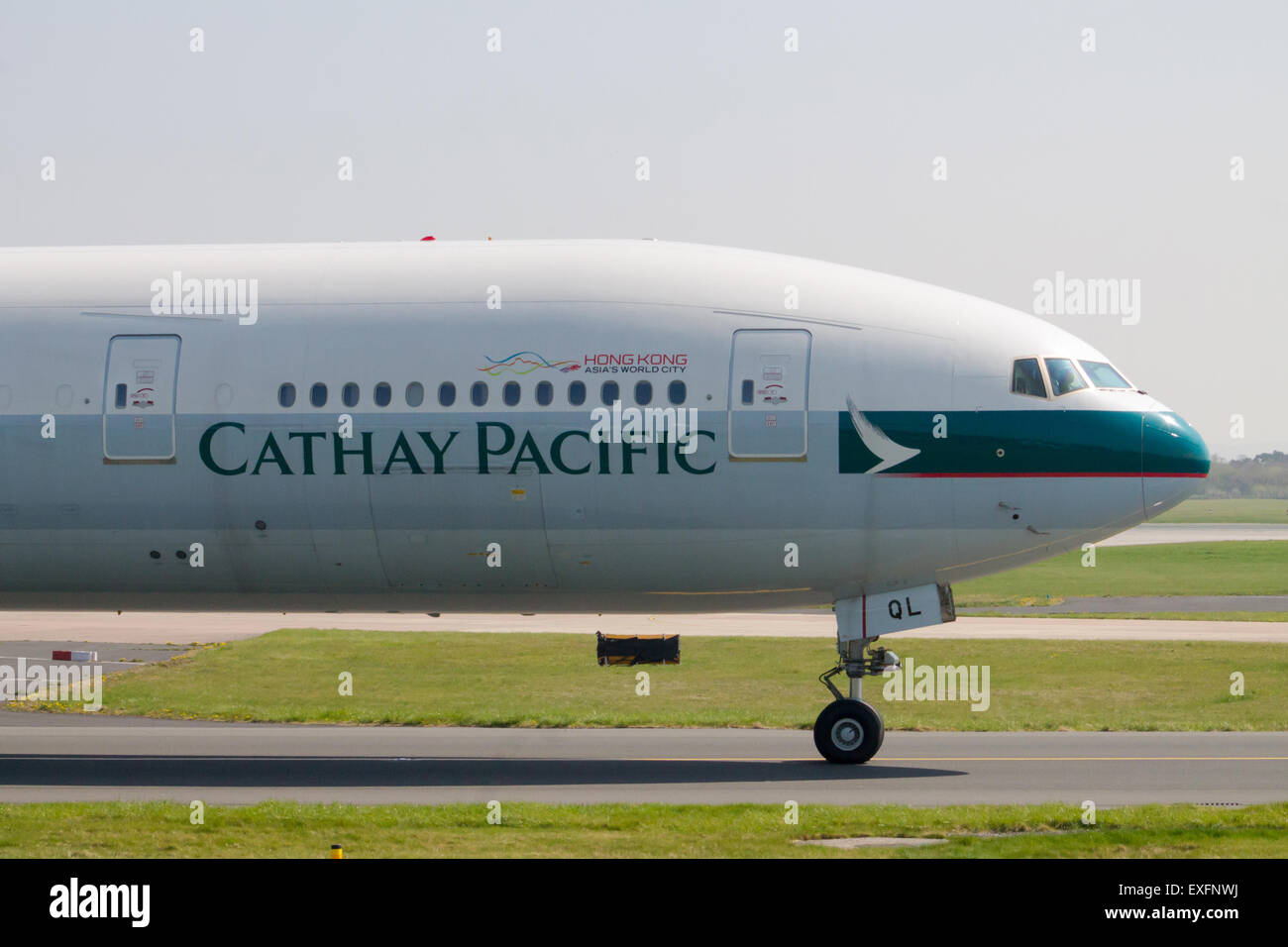 Cathay Pacific Boeing 777 taxiing on Manchester Airport taxiway Stock ...