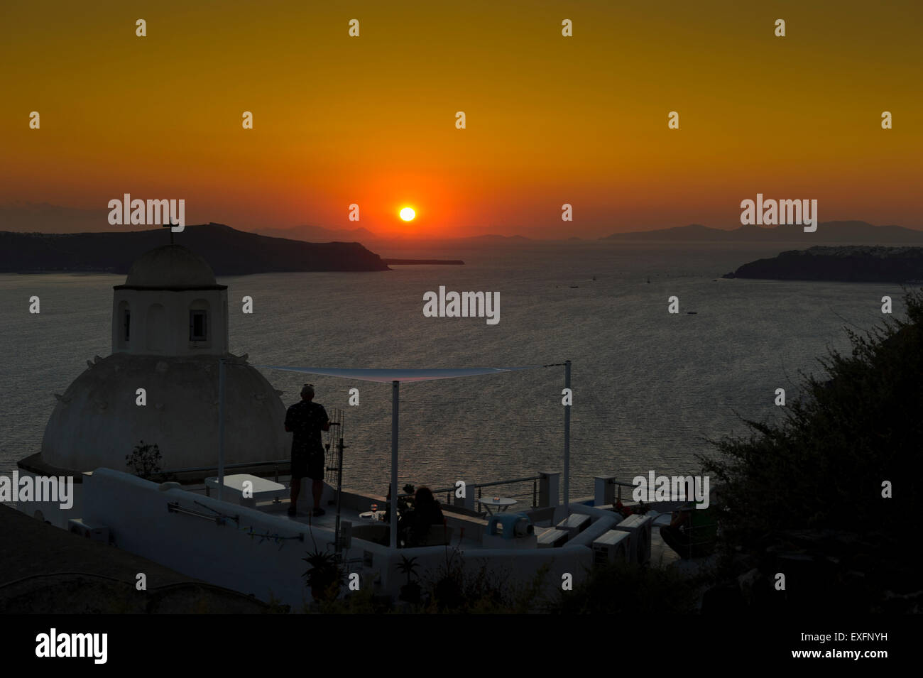A beautiful sunset in Fira, Santorini, Greece Stock Photo - Alamy