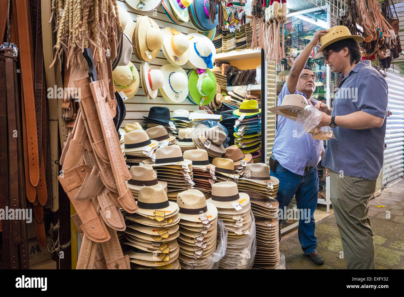 Salesman reaching put straw hat hi-res stock photography and images - Alamy