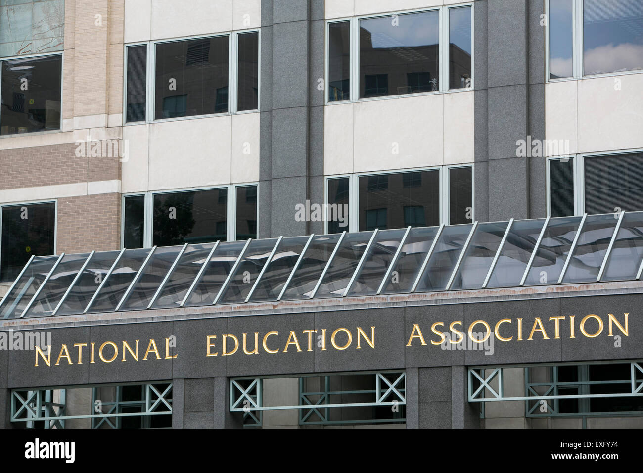 A logo sign outside of the headquarters of the National Education ...