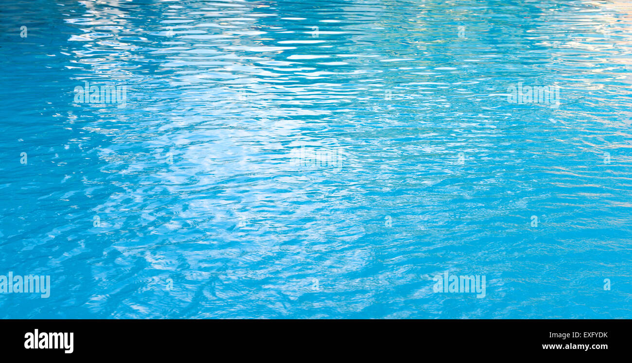 Blue water in the swimming pool with a wave Stock Photo - Alamy